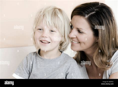Mother And Son On A Sofa Stock Photo Alamy