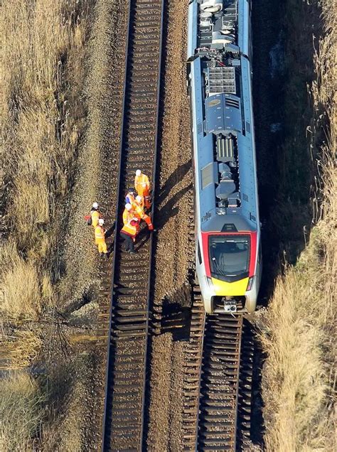 Panicked Passengers Stranded Aboard Train Dangling Above Sinkhole