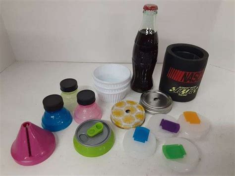 Coke Bottle Koozie And Assorted Lids Delaware Auction Center
