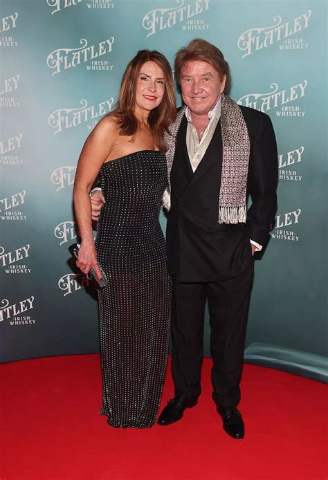 Michael Flatley Photographed With Wife Niamh And Teenage Son Michael Jr In Dublin Appearance