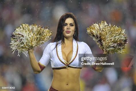 A Washington Redskins Cheerleader Dance During The Game Against The