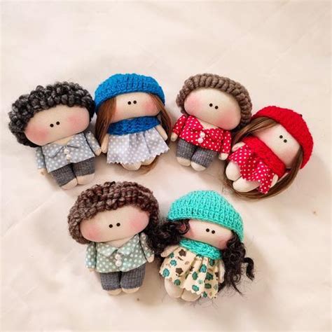 خرید و قیمت عروسک دختر و پسر ده سانتی از غرفه عروسک های روسی مینا