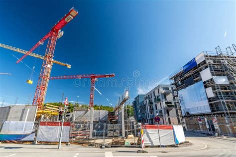 Large Construction Site With Cranes Scaffolding And Shell Of