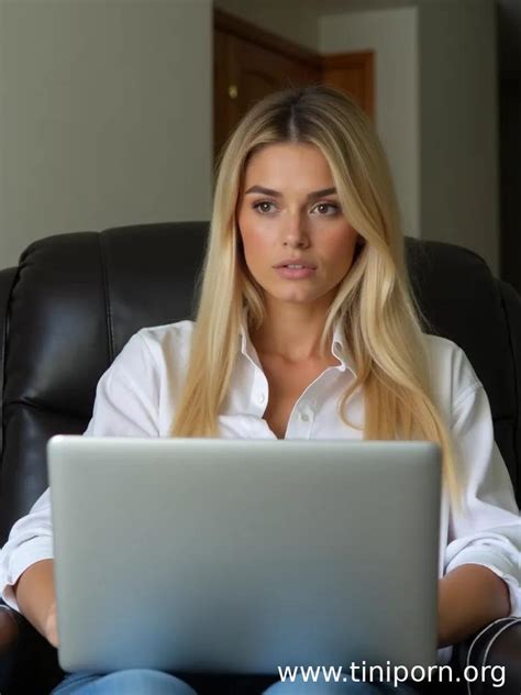 Teen Blond Girl Sitting In Chair Looking At Laptop Computer 417 Porn