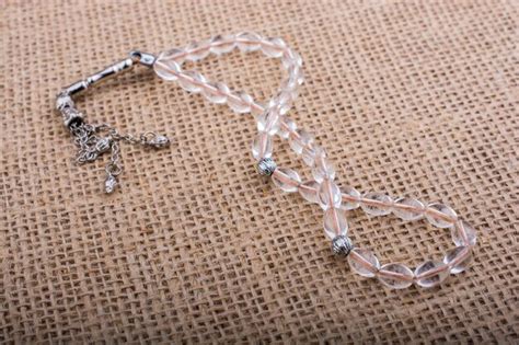 Premium Photo High Angle View Of Metal Chain Against White Background