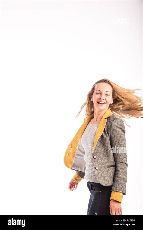 Female Blonde Swinging Long Hair Stock Photo Alamy