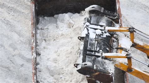 close up overhead above view of tractor loader machine snowplow shovel