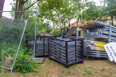 Scaffolding Poles And Brackets Stacked In A Yard Japanese Frame