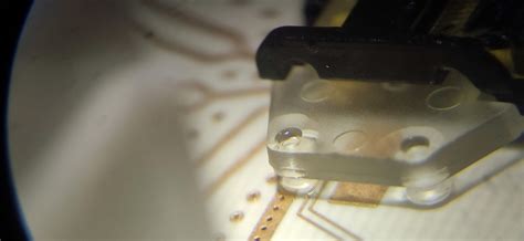 Active Alignment Of Fibre Arrays To Photonics Chips Sylex