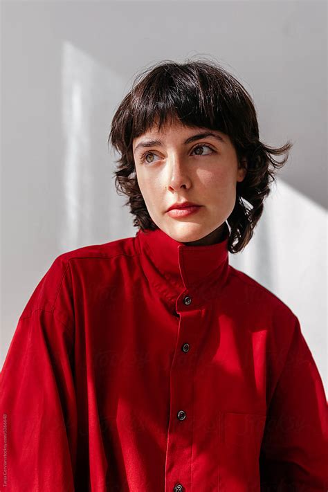 Young Gentle Female Model In Red Shirt By Stocksy Contributor Tania Cervian Stocksy