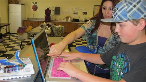 Middle School Student Liam Water Euler Coding His Arduino Lilypad