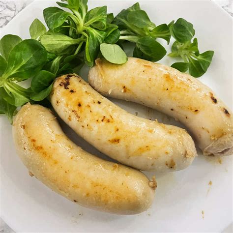 Cooking French White Sausages Boudin Blanc