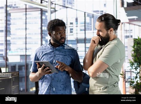 team of admins doing brainstorming working with machine learning tech