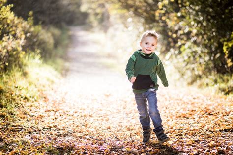 Boy Walking On Road