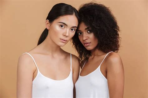Portrait Two Multinational Half Naked Women Posing Together Looking
