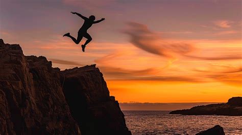 Free Sunset Cliff Diver Image Sunset Silhouette Diving Download