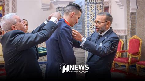 الملك يستقبل سفيان البقالي ويوشحه بوسام العرش