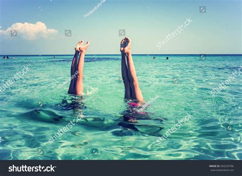 Women Bikini Doing Funny Underwater Handstand Stock Photo 594229796