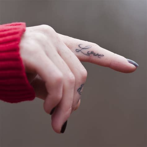 Tatuaggio Sulla Mano Piccolo Tatuaggiokn