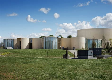 Plan 01s Crematorium Is Covered In Ribbed Concrete And Glass