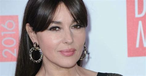 At 60 Monica Bellucci Turns Heads In Bold New Beachwear Shoot — Behind