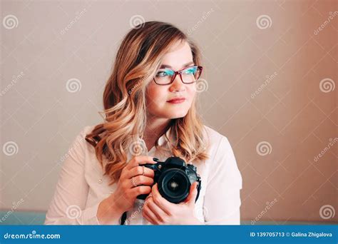 Candid Portrait Of Beautiful Blonde Girl Woman Photographer With Her