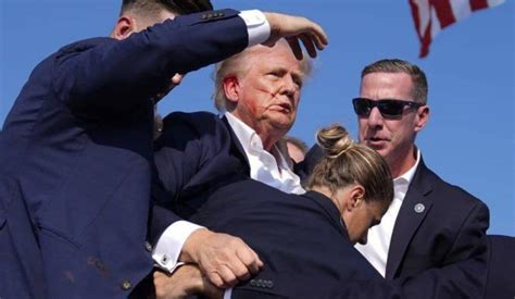 خبرآنلاین عکس تصویری واضح‌تر از صورت خونین ترامپ بعد از عملیات ترور