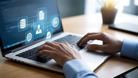 Businessman Working On Laptop With Data Analysis Icons Premium Ai