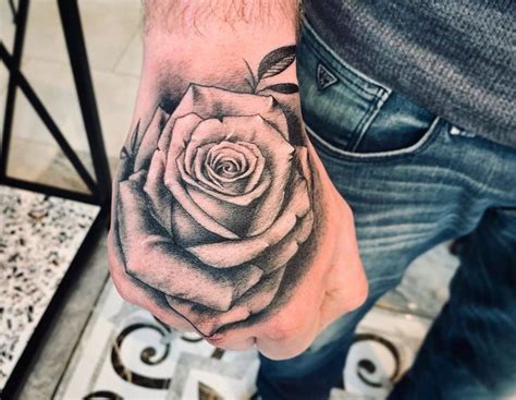 Realistic Rose Tattoo On Hand Black And Grey Shading Hand Tattoos