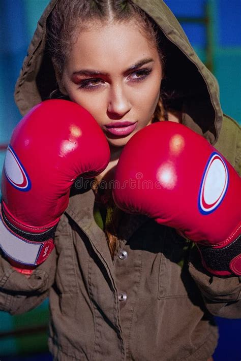 Young Female Boxer Ready To Fight In Old Leather Boxing Gloves Fitness