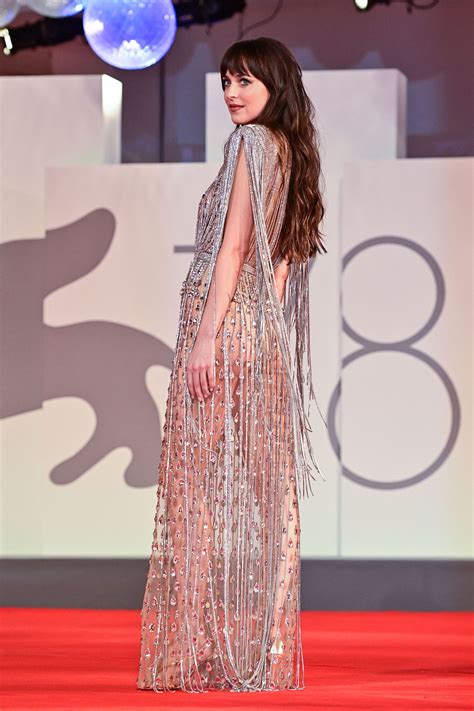See Dakota Johnsons Sheer Dress With A Crystal Fringed Cape Who What