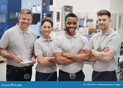 Portrait Of Engineering Teamwork Are Showing Hands Up After Business