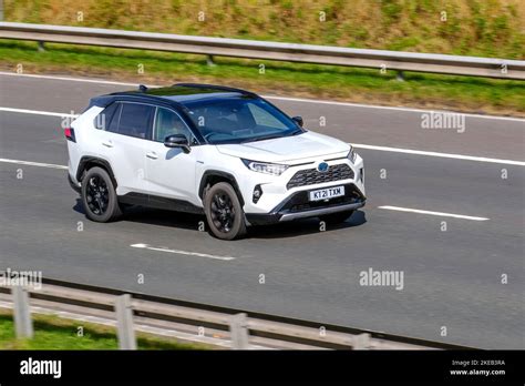 2021 White Toyota Rav4 Vvt I Excel Hybrid Electric 1 Speed Automatic Travelling On The M6