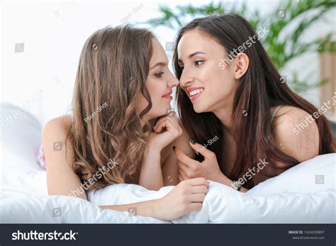 71 Thousand Sexy Lesbian Laying On Bed Deeply Kissing Royalty Free