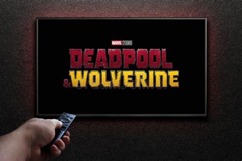 Wolverine And Deadpool Trailer Or Movie On Tv Screen Man Turns On Tv