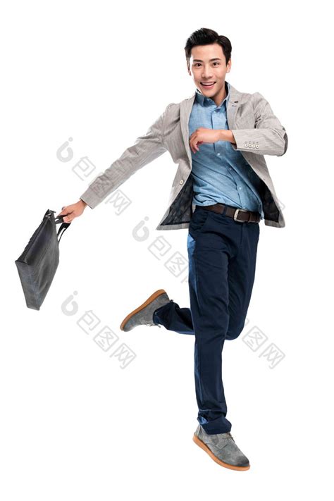 快乐跳跃的青年商务男士 包图企业站