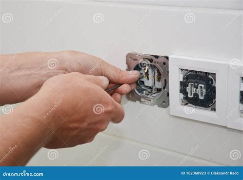 Electrican Repair And Install Socket Outlet Plug And Switch Stock Image Image Of Electric