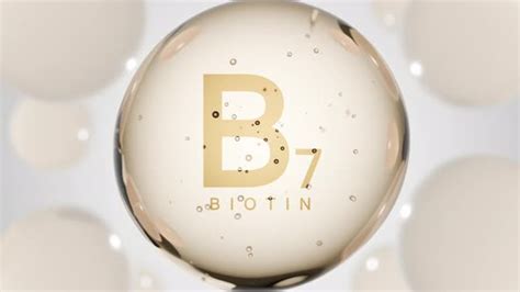 A Golden Glossy Sphere With Vitamin B7 Biotin Pill Capsule Abstract 3d