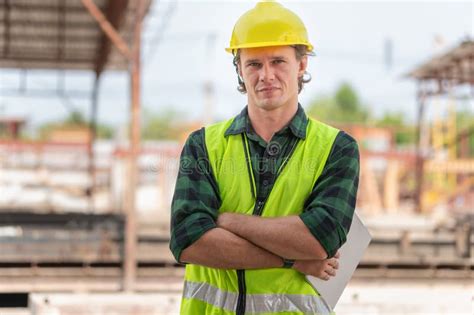 Engineer Man Arms Crossed With Digital Tablet Checking Project In The Precast Concrete Factory
