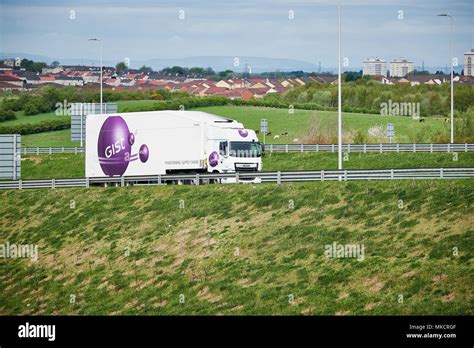 Gist Delivery Trailer And Lorry Driving Along M8 Glasgow Scotland Stock