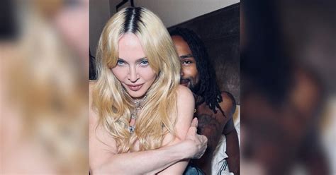 Madonna Shares Flirty Summer Snaps With Mystery Man
