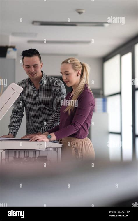 Business Couple Copy Documents Stock Photo Alamy