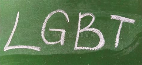 LGBT Abbreviation Written In White Chalk On A Green Babe Board