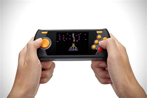 The Atari Flashback Lets You Play 60 Old School Video Games In The Palm Of Your Hand Maxim