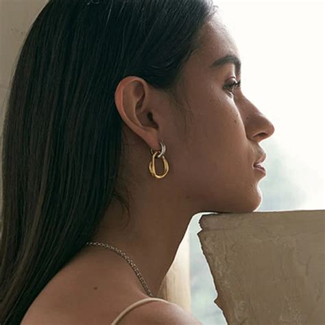Unique Dual Tone Twist Design Hoop Earrings On Luulla