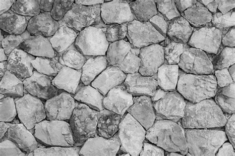 완벽 한 흰색 패턴 장식 회색 슬레이트 돌의 벽 색된 돌 또는 시멘트 또는 사암 블록의 현대 스타일 디자인 장식 고르지 금이 Realmasonry 벽의 표면 건물 외관에