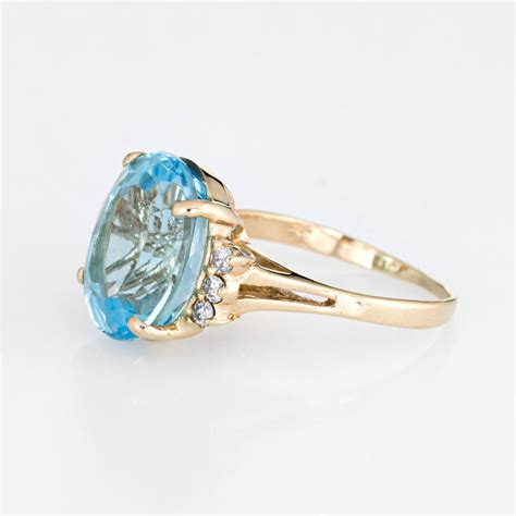 12 Carat Blue Topaz Diamond Ring Estate 14 Karat Gold Oval Cut Cocktail