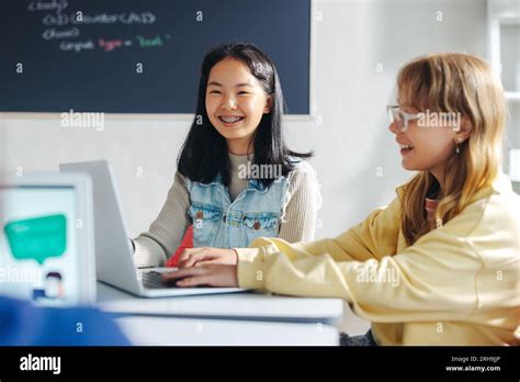 Elementary School Students Learning Coding And Computer Programming In Elementary School Students Learning Coding And Computer Programming In