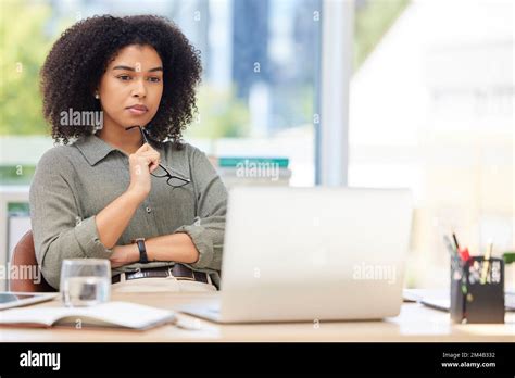 Business Laptop Thinking And Black Woman In Office Trying To Solve