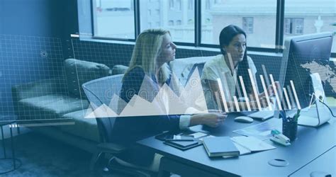 Two Women Working At Office Desk With Data Analytics Animation Overlay Stock Video Video Of